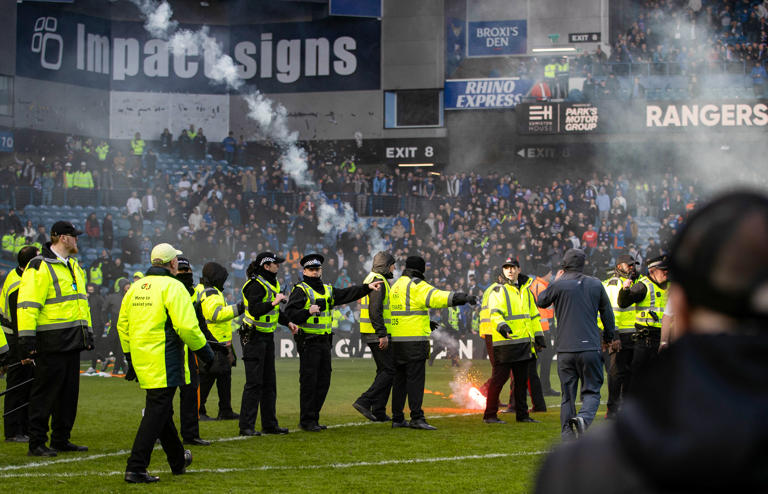 Police Scotland condemn 'despicable' Rangers vs Celtic pitch invasion ...