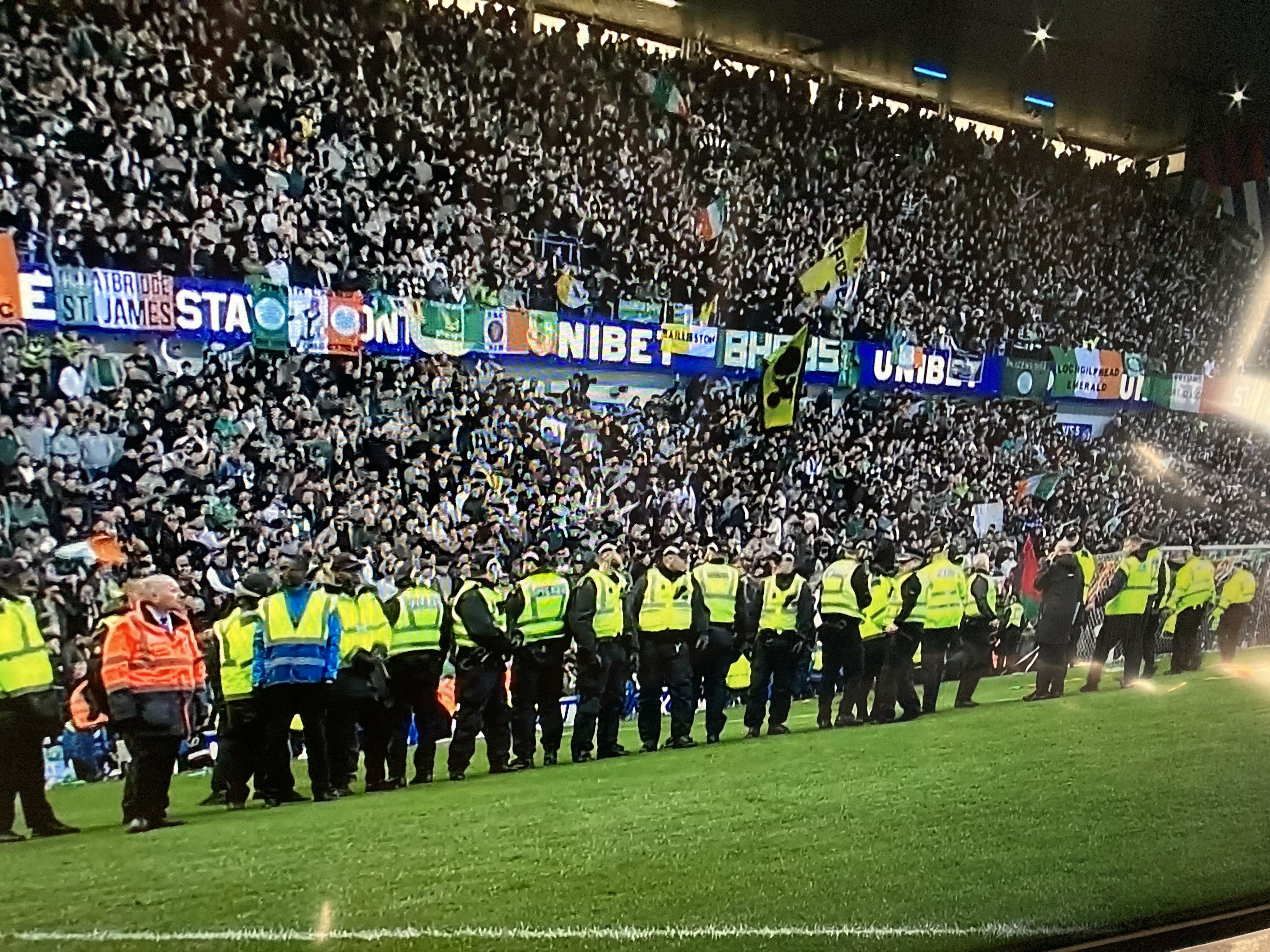 Rangers and Celtic ends in 'lunacy' as fans ignite tense pitch invasion ...