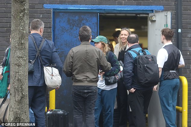 Noel Gallagher and Tori Cook sneak out of Euston Station side exit ...