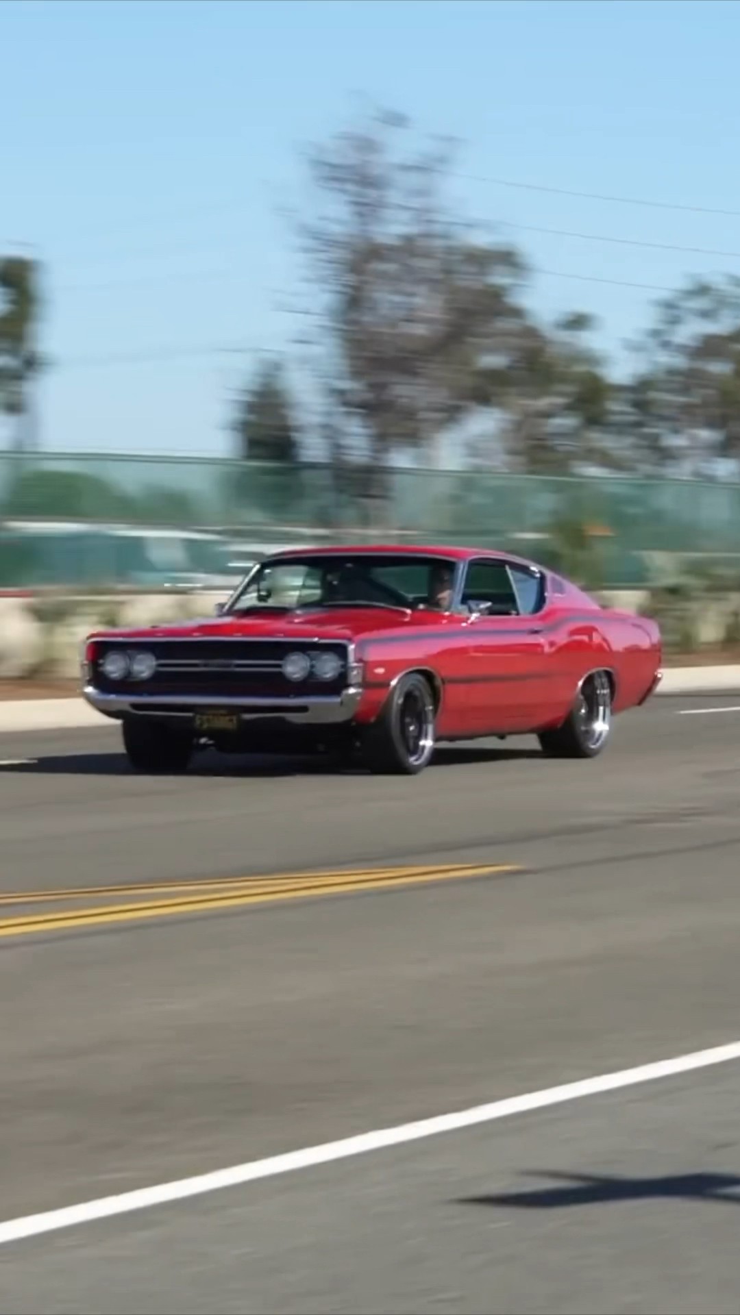 427 stroker Ford Torino roars through the street
