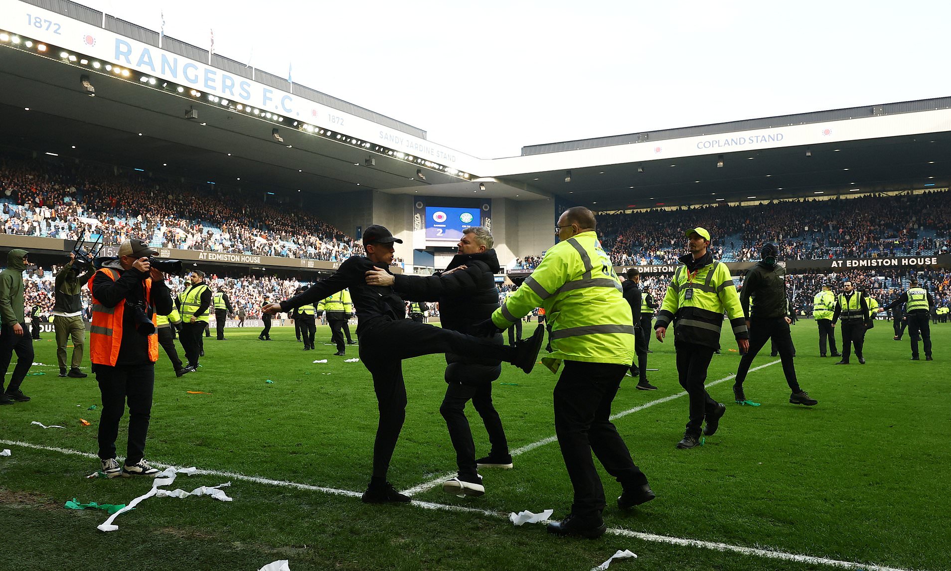 Police condemn 'shameful' scenes after pitch invasion at Celtic's ...