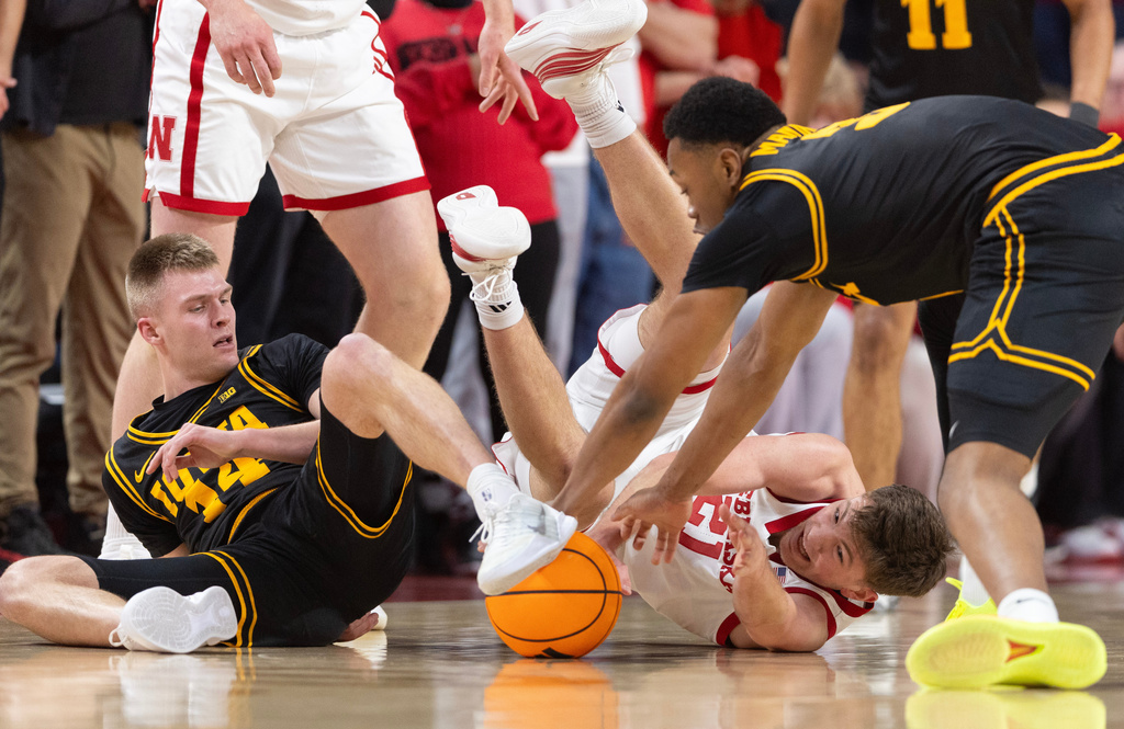 Cale Jacobsen scores 15 and No. 9 Nebraska beats Iowa 84-75 in overtime ...