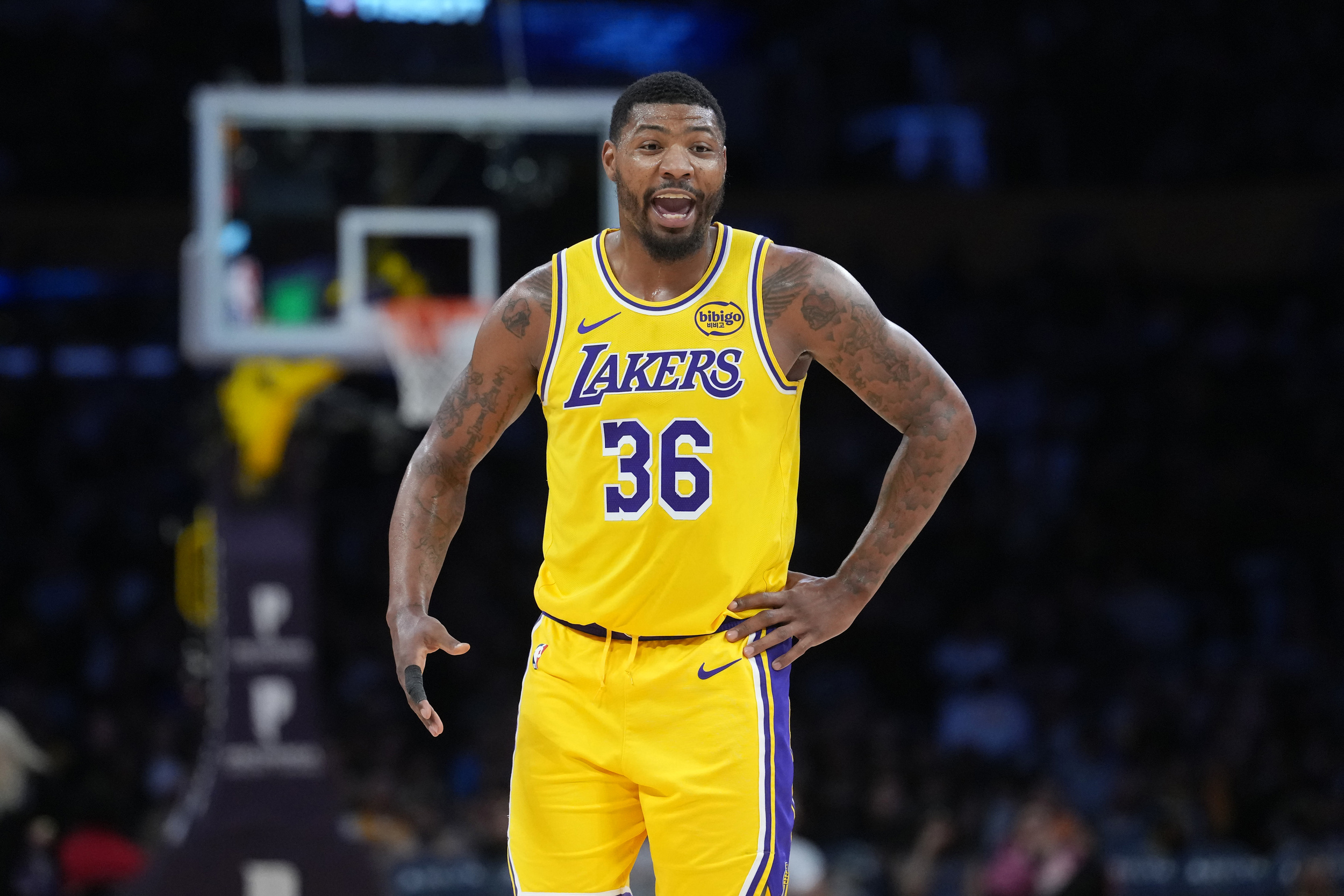 Marcus Smart has a collision with Bill Maher during Lakers-Knicks game