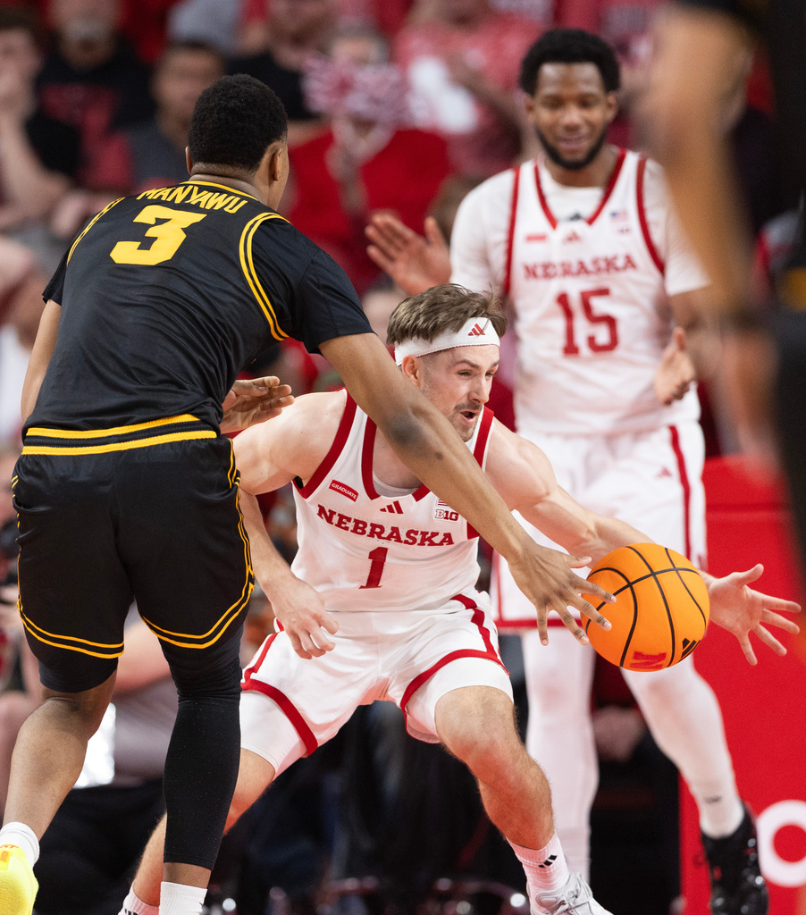 Cale Jacobsen scores 15 and No. 9 Nebraska beats Iowa 84-75 in overtime ...