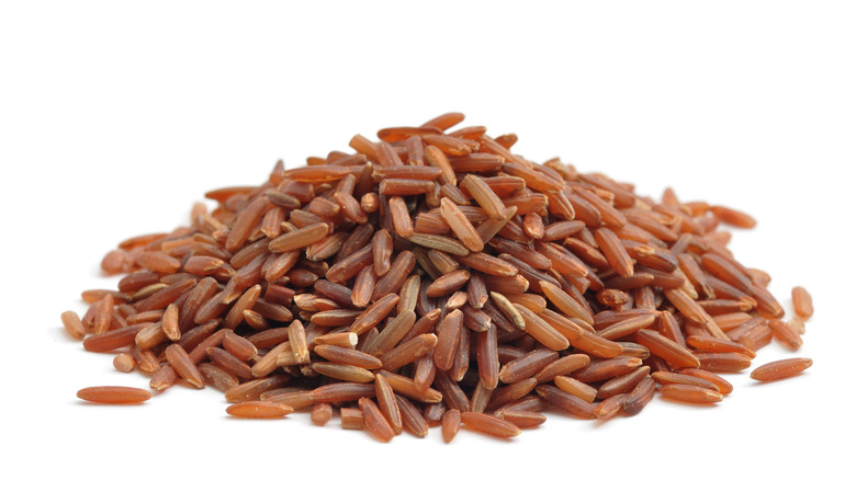 What is the best method for cooking red rice?