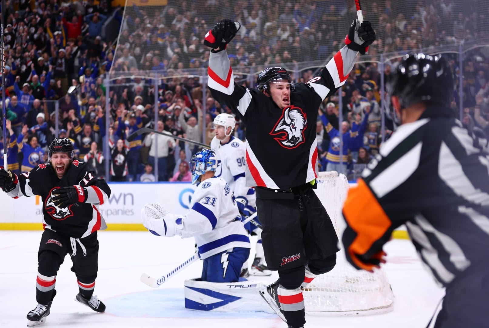 Sabres alone atop Atlantic Division standings following wild win over ...