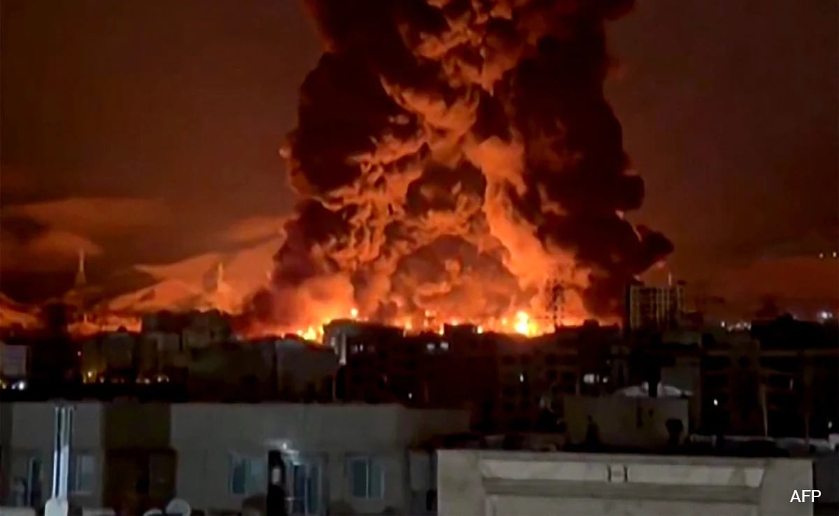Acid rain fears in Tehran as Israeli strikes on oil depots send toxic ...