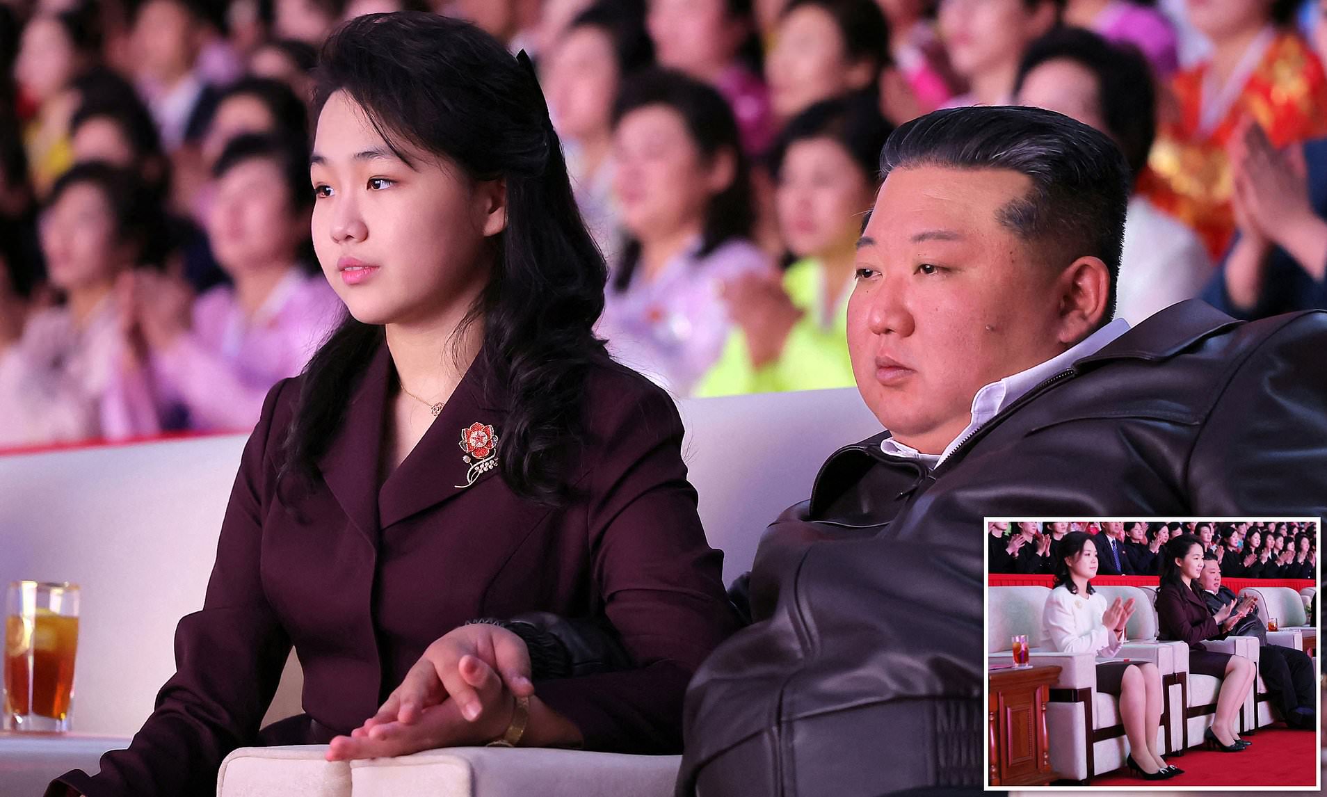 Greying Kim Jong Un sits hand-in-hand with daughter at concert while ...