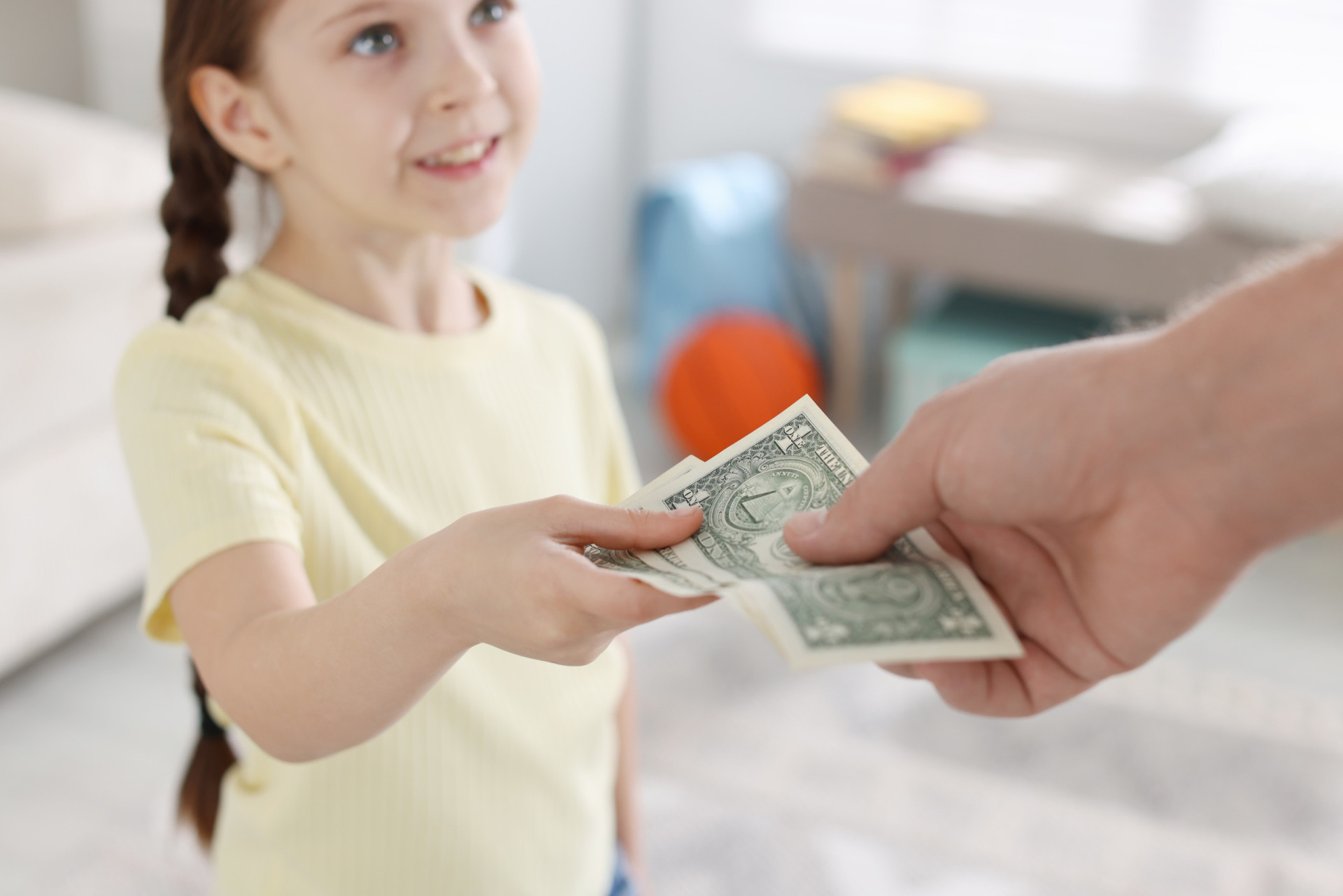 How does an allowance make kids more financially literate?