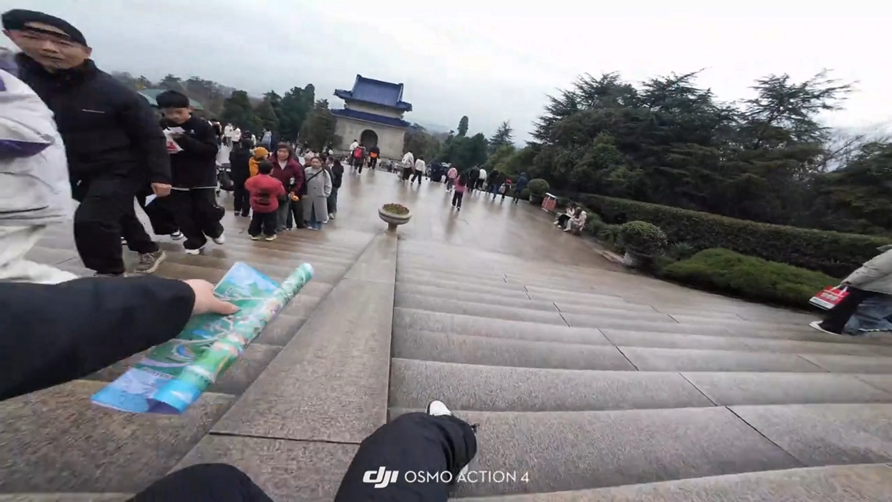 Man slides down slippery stairs in Neimenggu, China