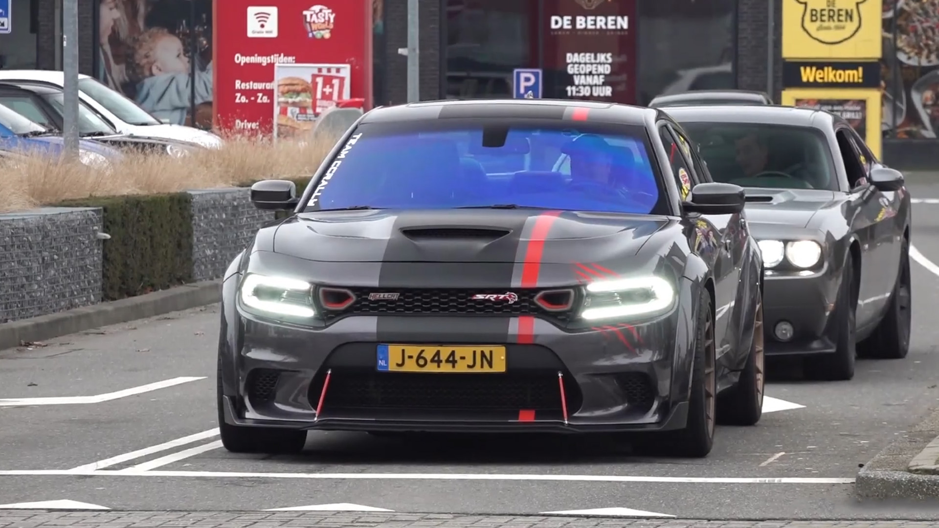 Dodge Charger Hellcat accelerating through the city streets