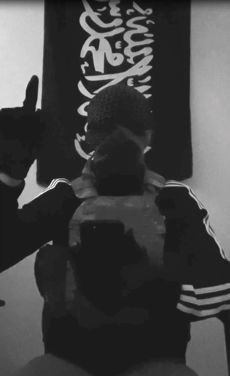Suspected terrorist defiantly flashes ISIS salute after he's busted for ...