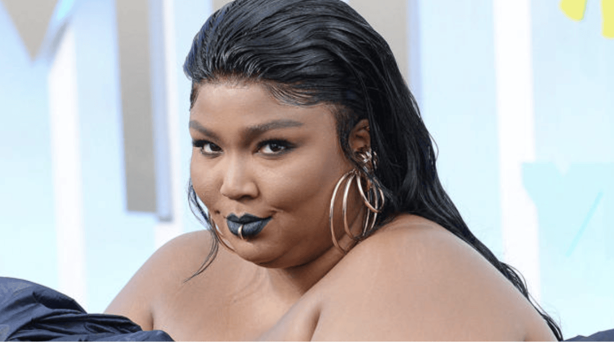 Lizzo shows off her 60-pound weight loss transformation in sparkly mini ...