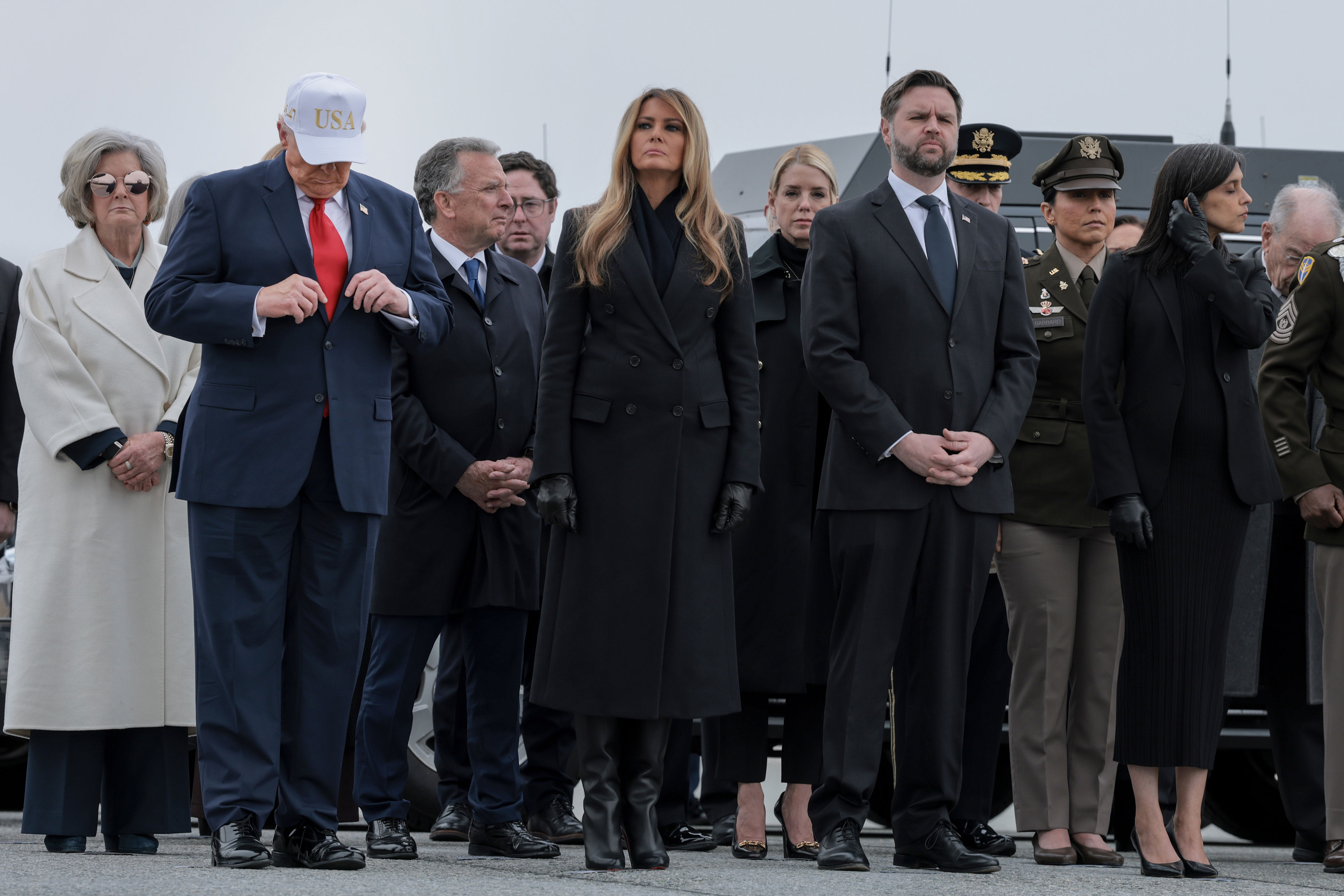 Trump’s wearing of baseball cap during dignified transfer draws criticism