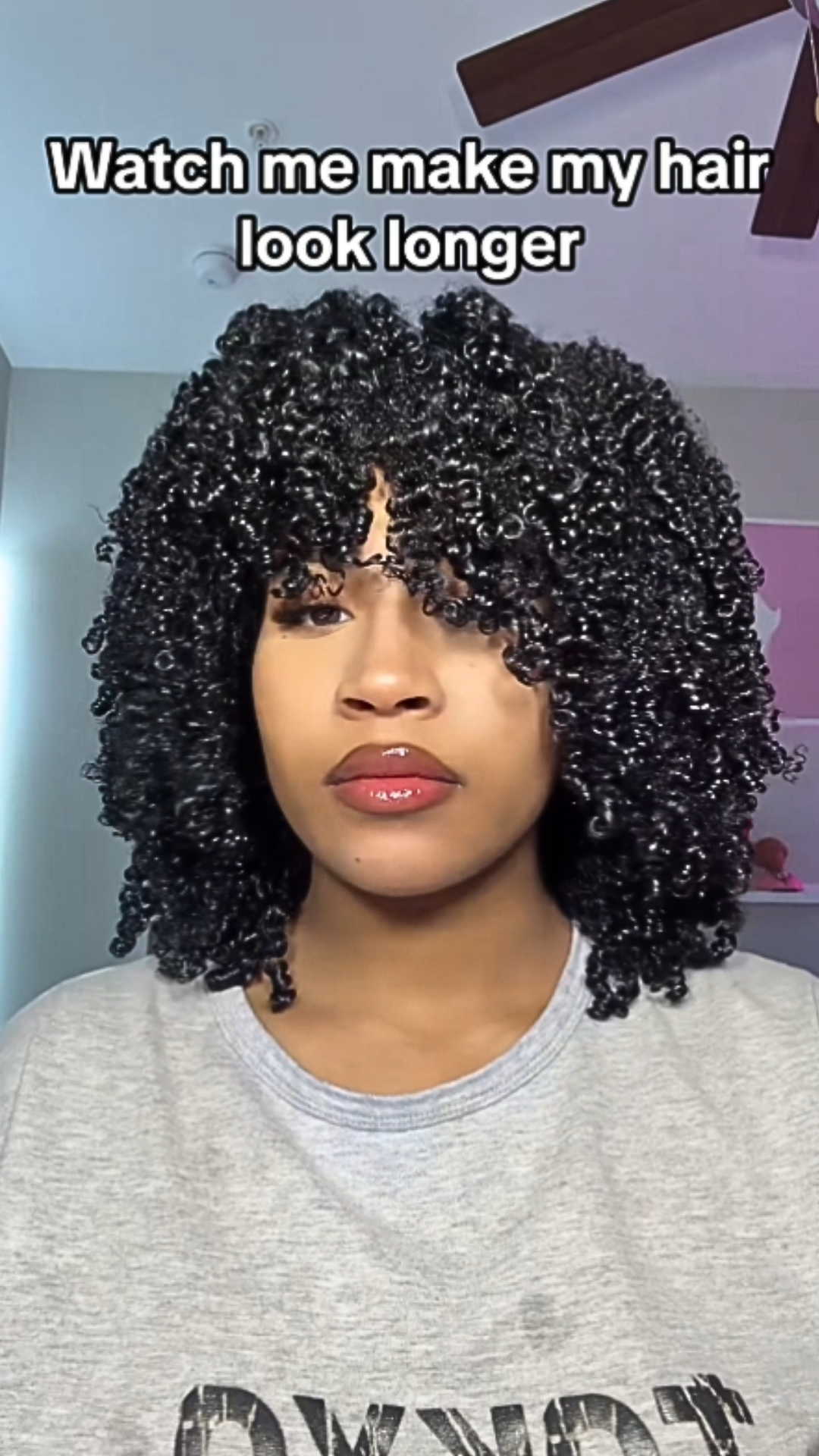 Heatless hair stretching method with satin ties