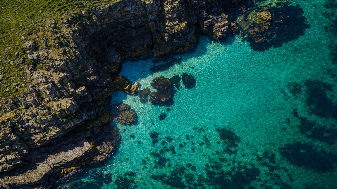 An ocean so clear you can see the rocks below
