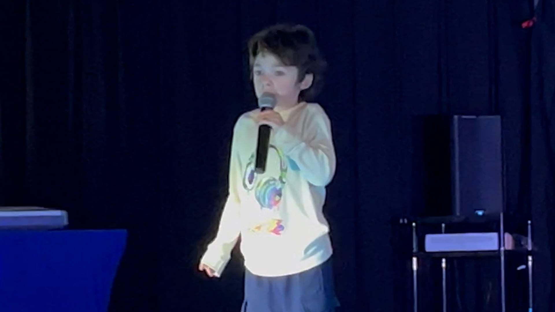 Moment non-verbal boy sings along to Adele for school talent show