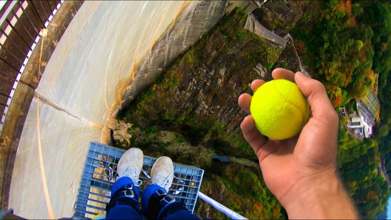 Trying to catch a tennis ball during a bungee jump from 720 ft
