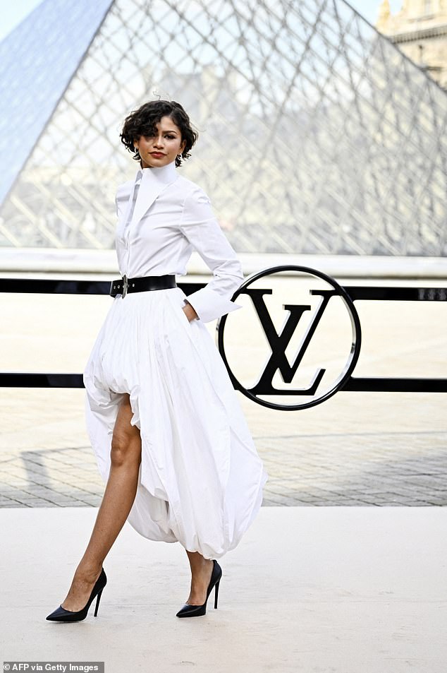 Zendaya flashes gold wedding band as she leads stars at Louis Vuitton ...