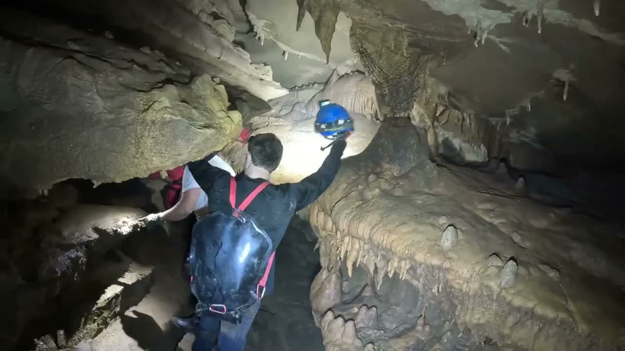 A man dug open a cave by the river and found something bizarre