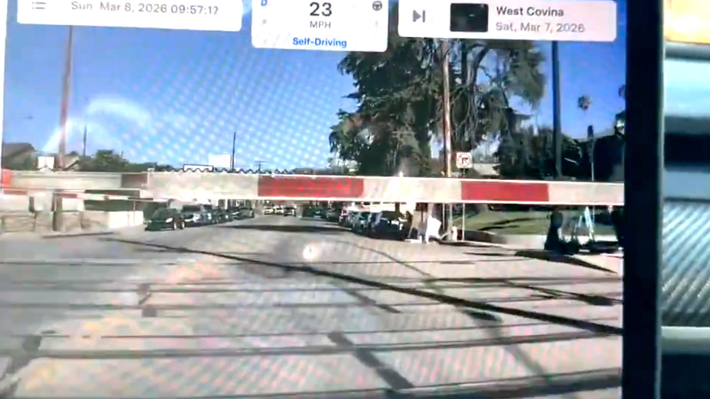 Tesla on FSD appears to smash through railroad gates as train approaches