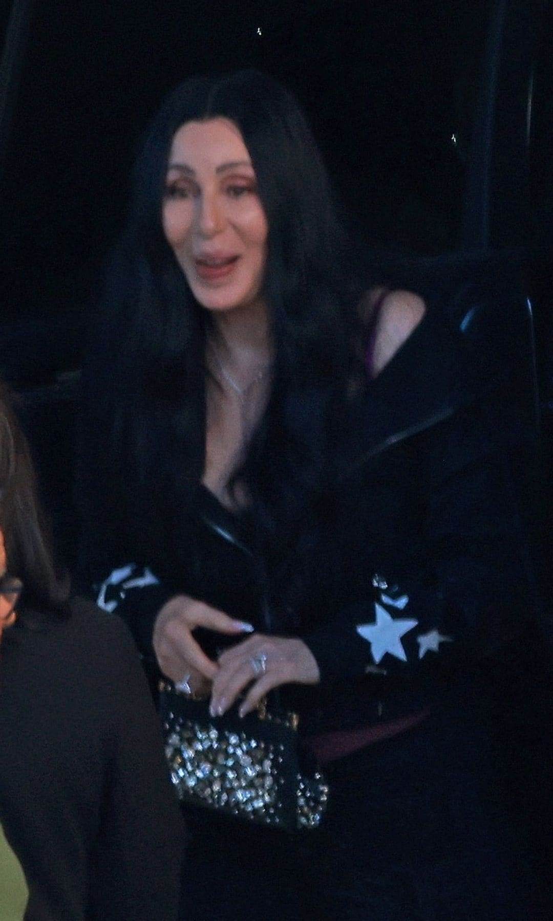 Cher fuels marriage speculation with massive diamond ring and band at ...