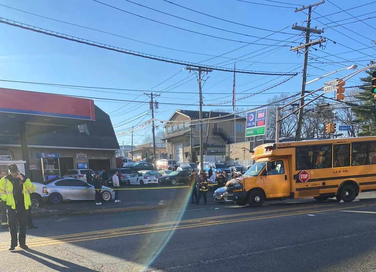 Pedestrian pinned under school bus carrying children in Hackensack