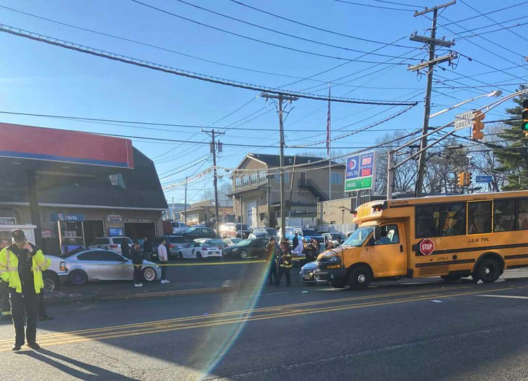 Pedestrian pinned under school bus carrying children in Hackensack