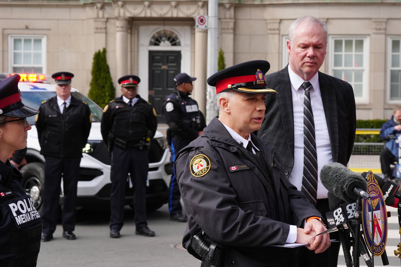 Police search for two suspects after US consulate in Toronto hit by gunfire