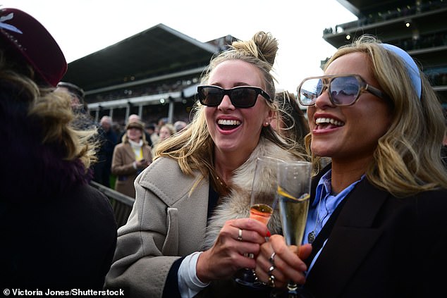 Cheltenham punters enjoy boozy first day of races as pints flow in ...