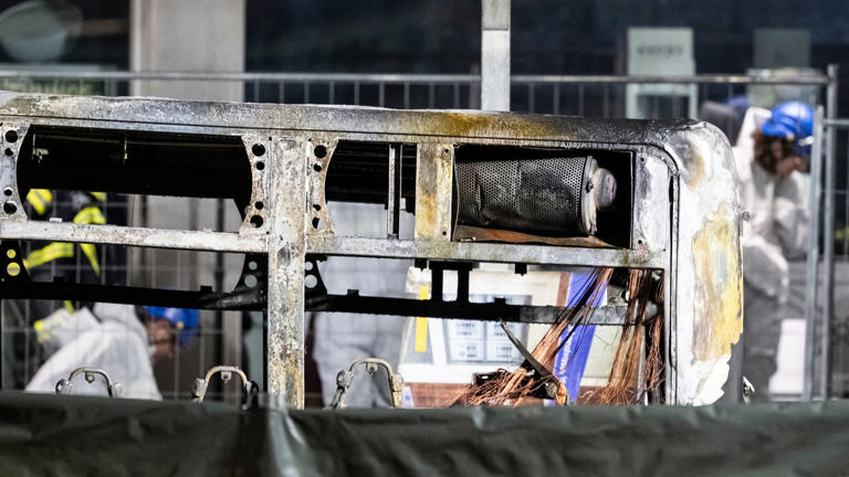 Six dead in 'deliberate' bus fire