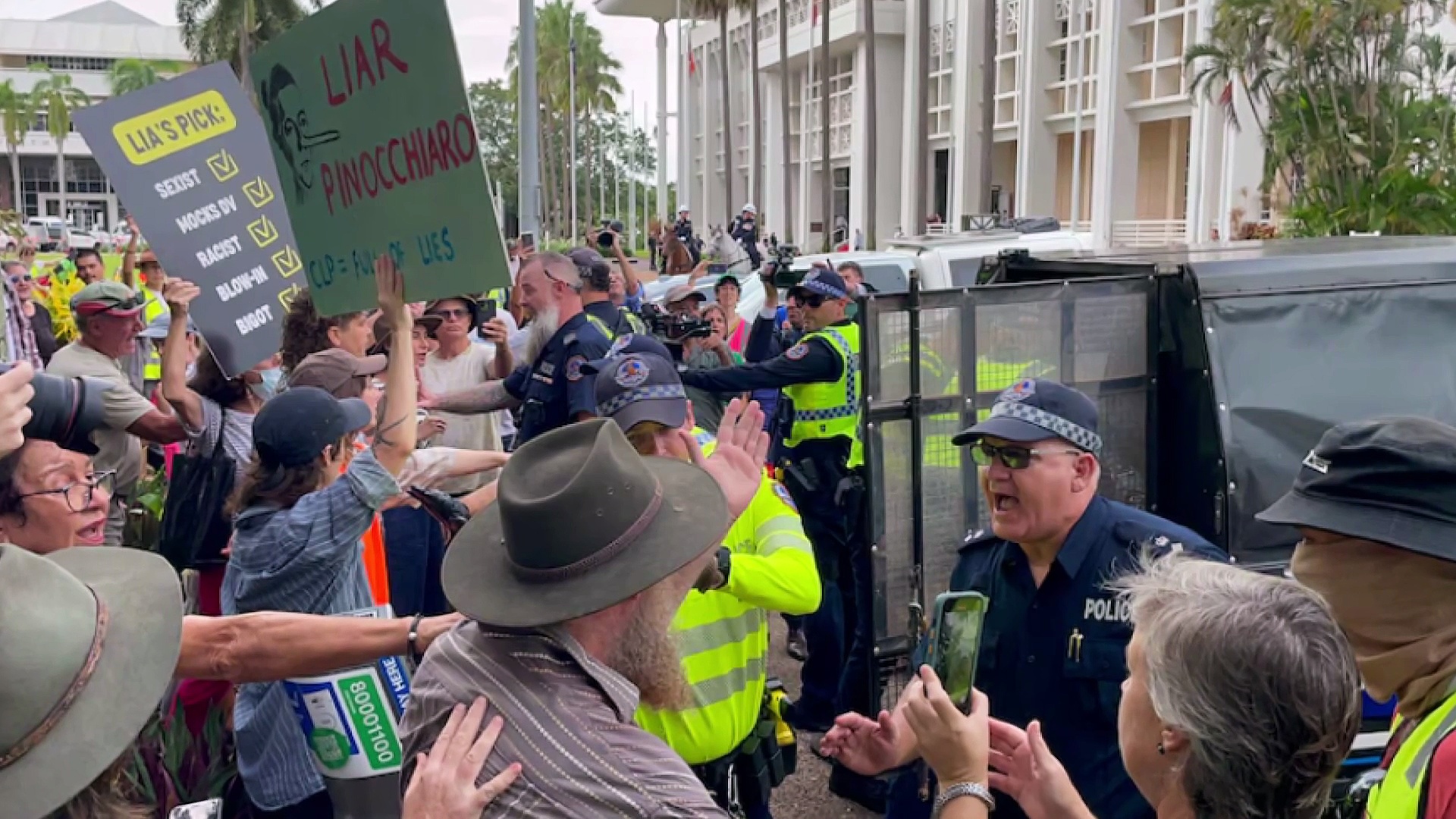 Protester arrested as Northern Territory Administrator David Connolly ...