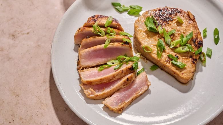 Aromatic soy and ginger-marinated tuna steaks recipe