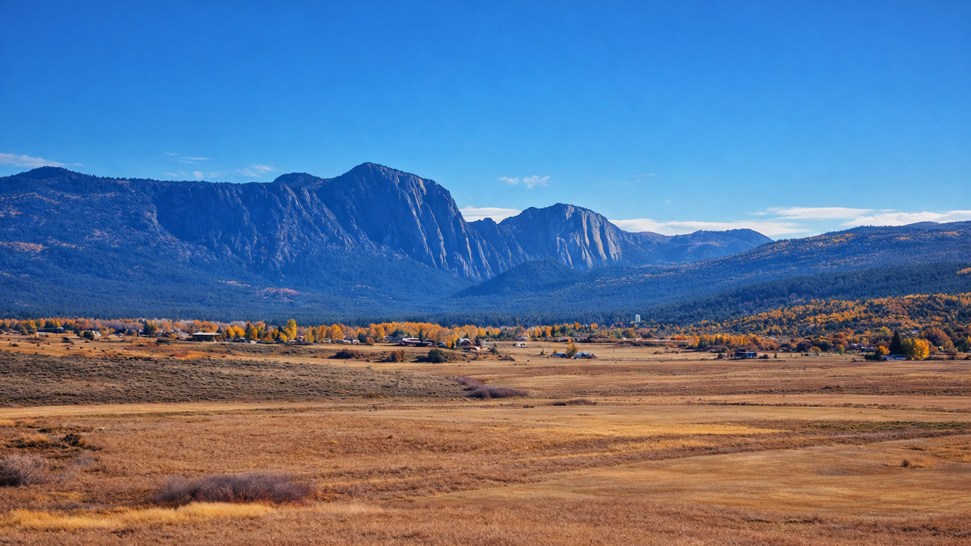 Golden plains below Brazos cliffs in Chama