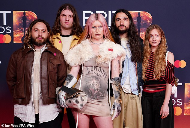 Wet Leg's Rhian Teasdale arrives at BRIT Awards with bloodied knees in ...