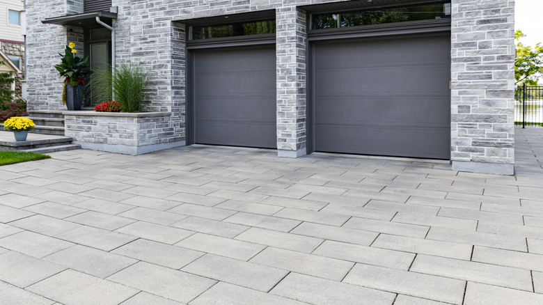 Goodbye boring concrete: The luxury driveway design that looks so chic