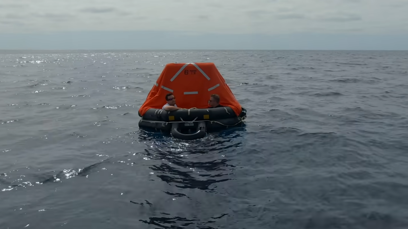 They drifted 15 miles offshore - in shark-filled waters