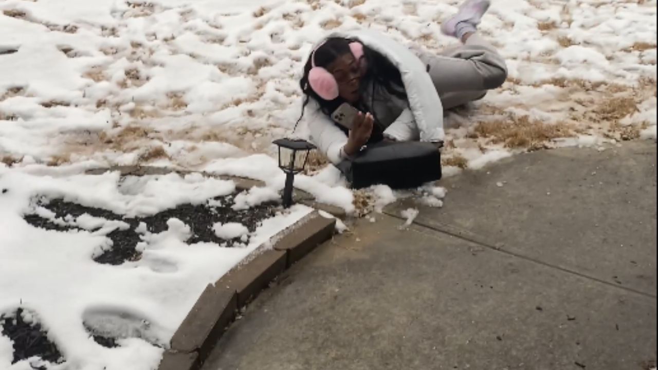 Thrilled girl's dash to the entrance leads to a hilarious tumble before ...