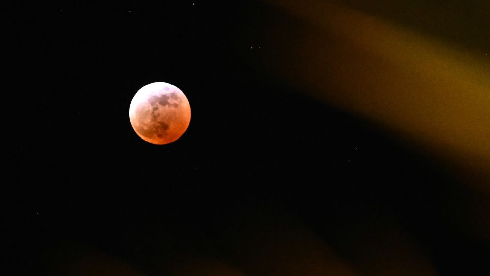 A total lunar eclipse is turning the moon red. Here’s how to watch