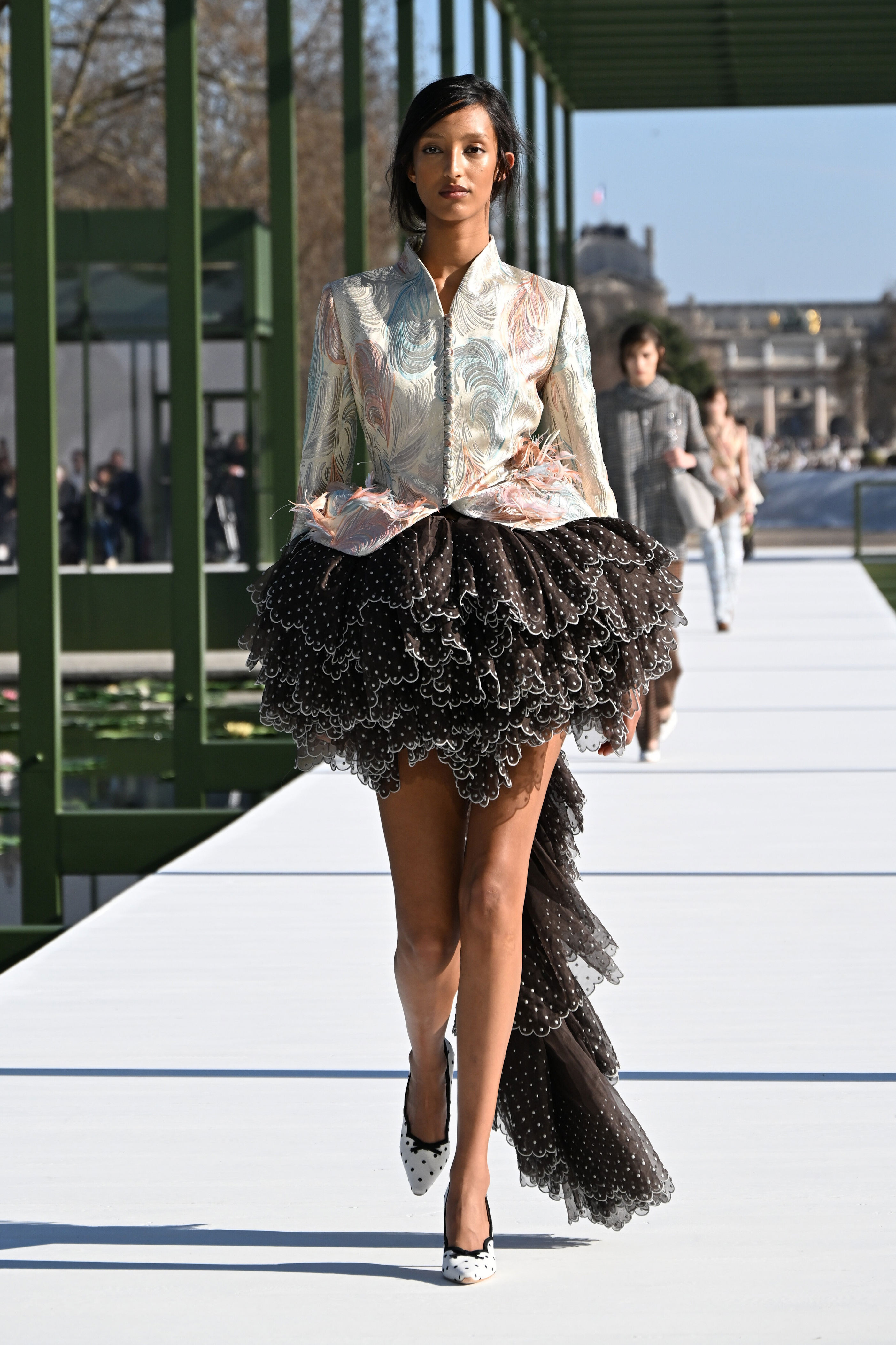 Dior blooms with peplums, bustles and waterlily florals in Paris ...