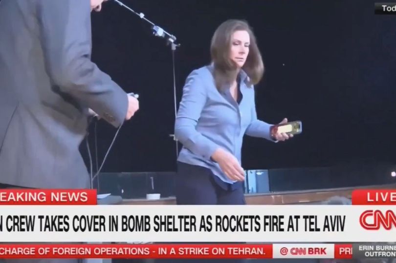 CNN anchor Erin Burnett forced to take shelter live on air as sirens ...
