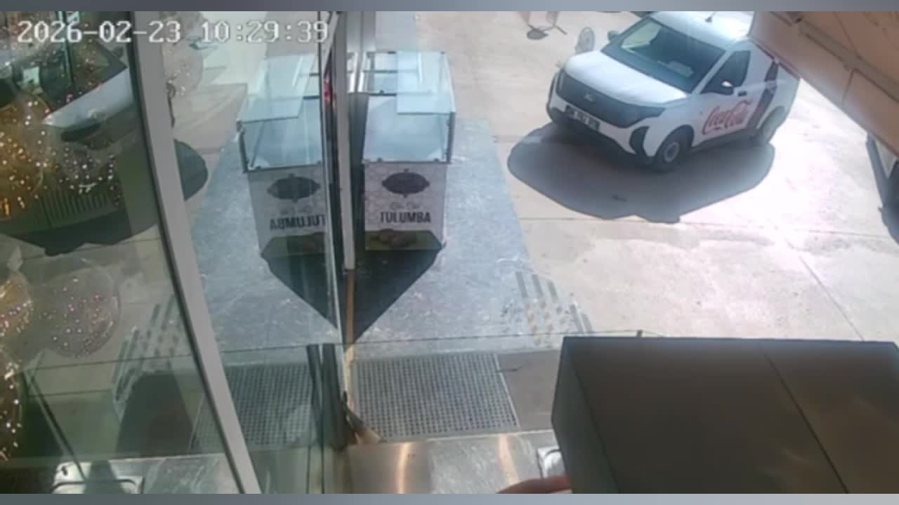 Car crashes into glass shopfront in Turkey