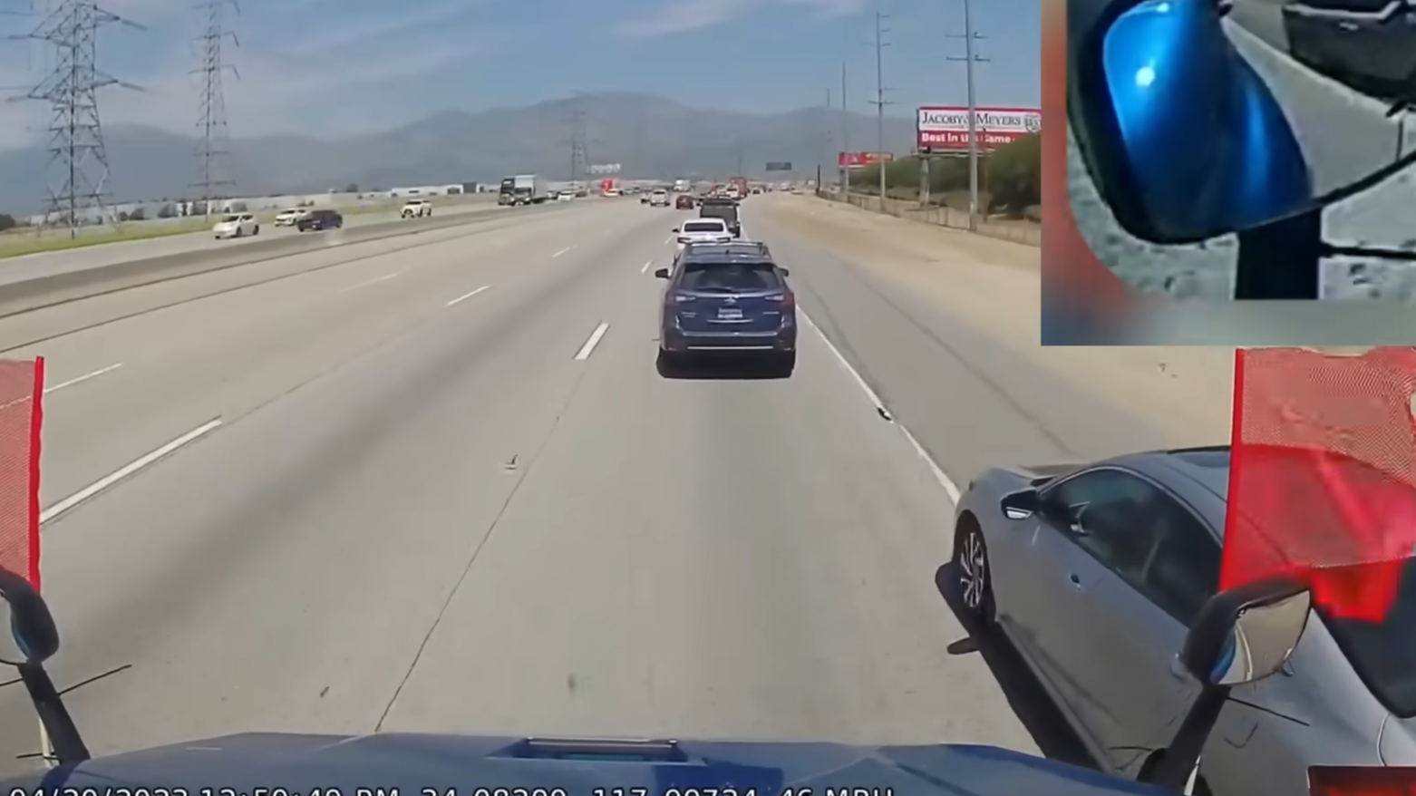 Driver forces a merge, cuts off a truck, then gets hit on camera