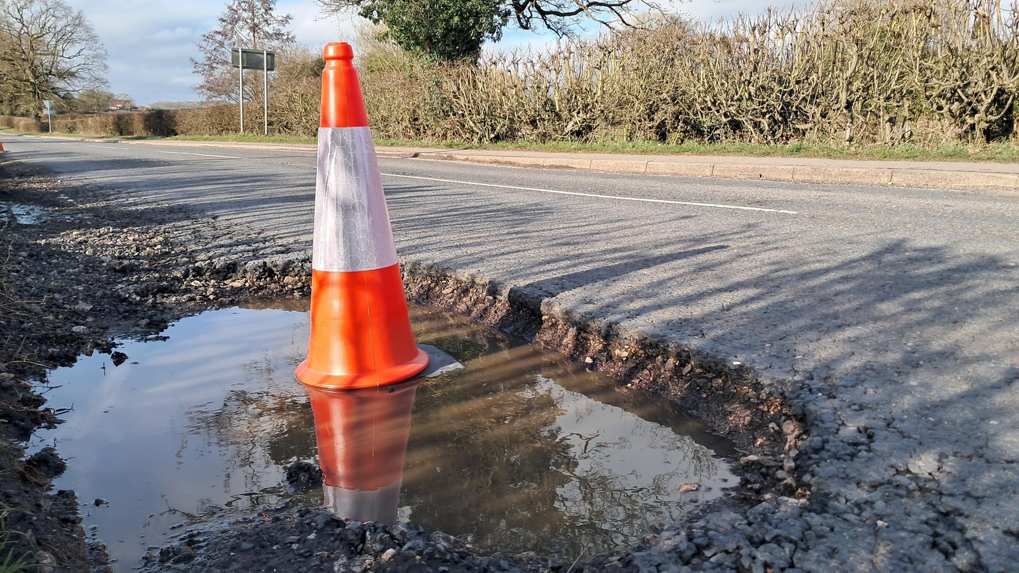 Massive potholes on Derbyshire road are “death trap” - after Jaguar XKR ...