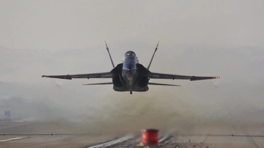 Watch a Blue Angels F/A-18 rip past at head height