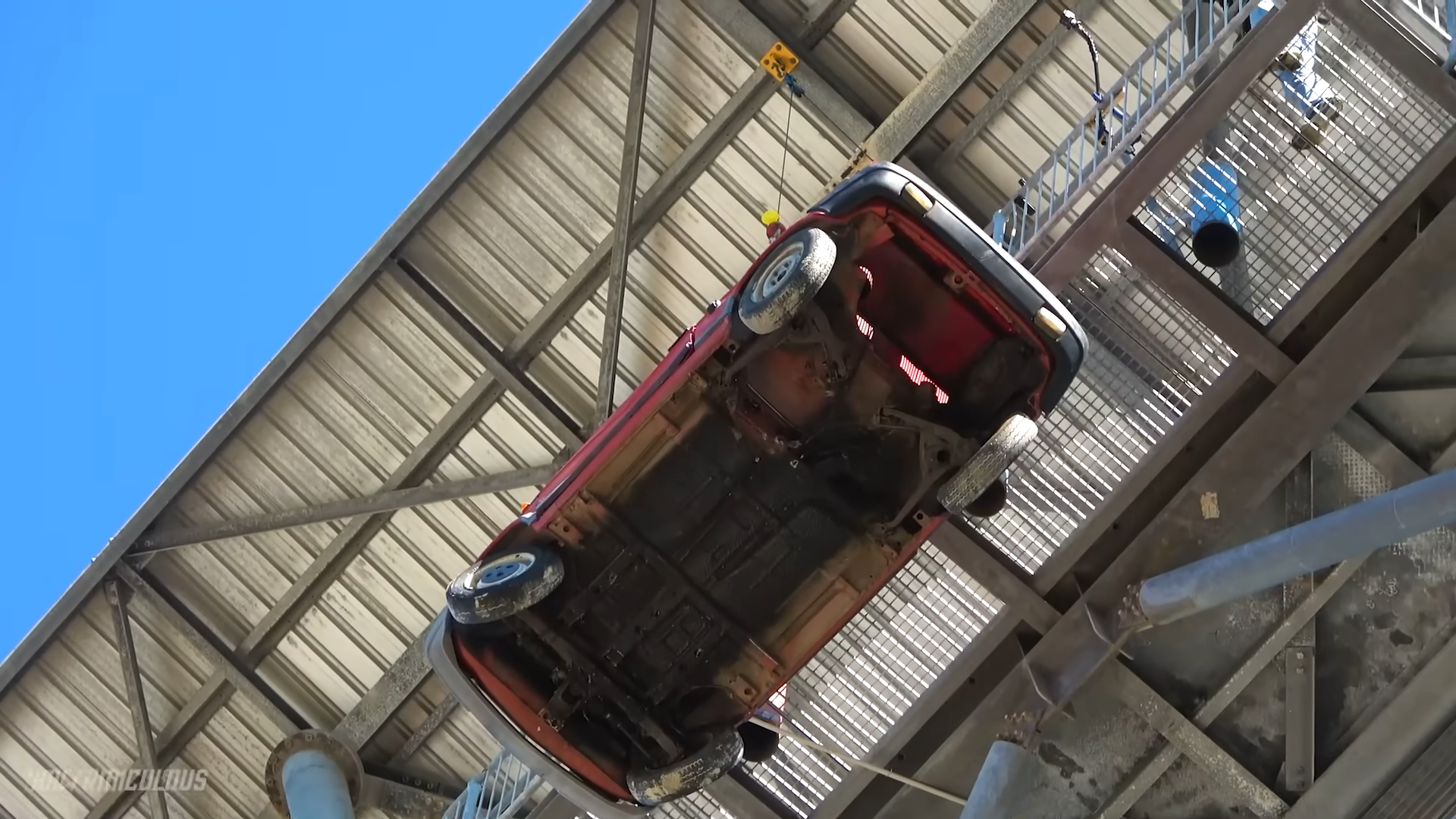 We dropped 3,000 lb car on giant axe from 150 ft