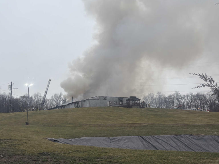 Video: Massive fire burns for hours at vacant event center in ...