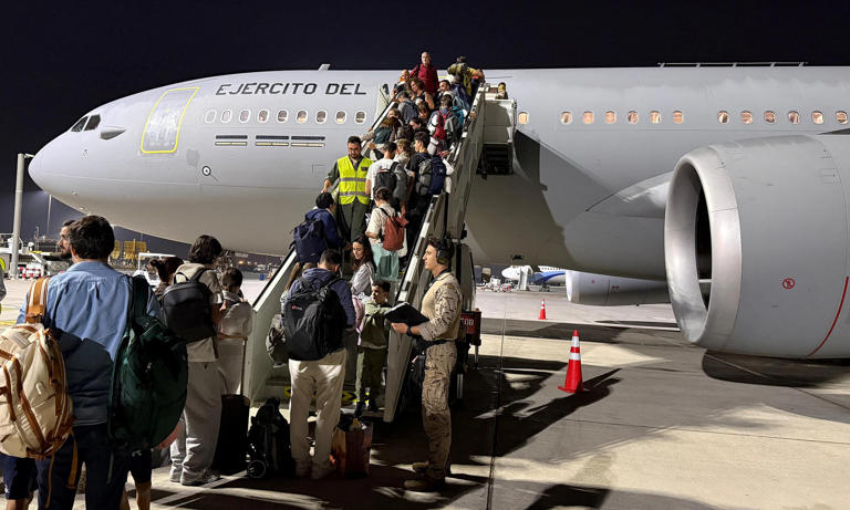 'Total farce' as first UK government chartered flight out of Middle ...