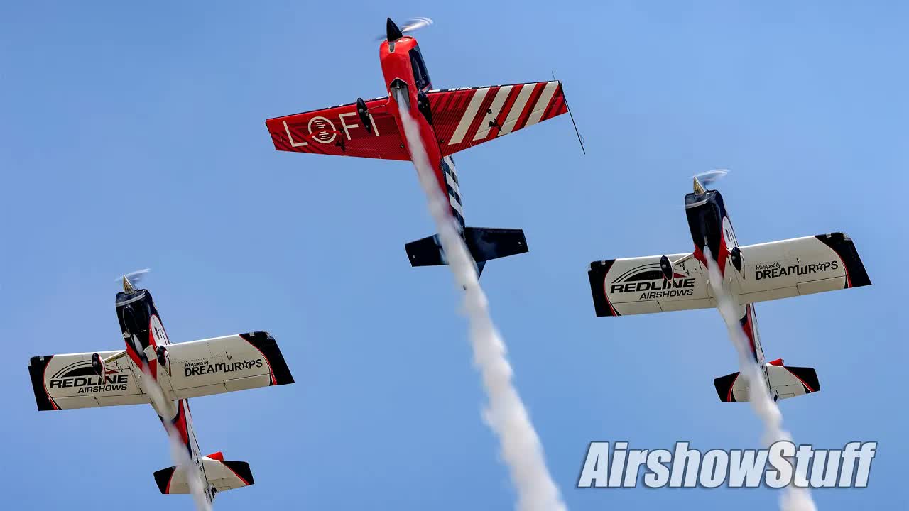 Watch aerobatic planes rip across the sky in a wild airshow performance