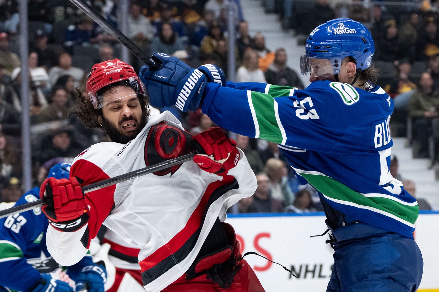 Beleaguered Vancouver Canucks show fight in loss to high-powered ...